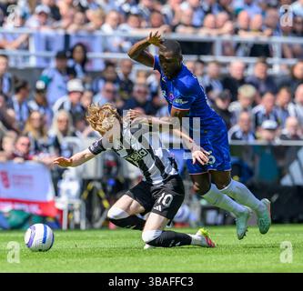 Newcastle United's Anthony Gordon (left) is fouled by Crystal Palace's ...