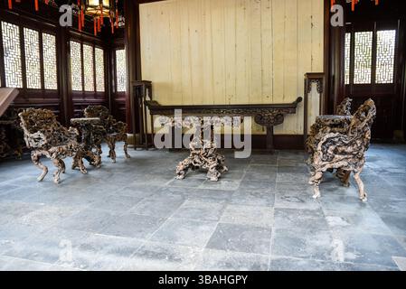 Shanghai, China - 1 April 2025: Artistic banyan root chairs inside He ...