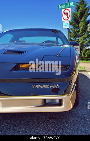 Pontiac Trans Am muscle car parked on the side of the road. Vintage ...