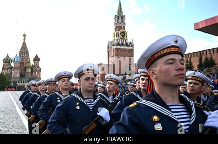 Two naval officers render a salute during a change-of-command ceremony ...