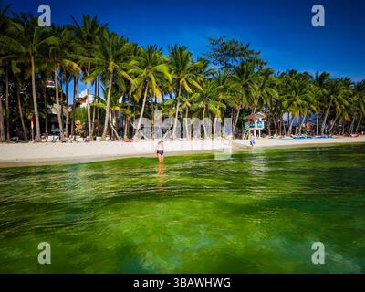 05 13 2025 - Boracay, Philippines. Massive algae bloom making emerald ...