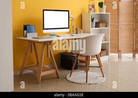 Interior of office with workplace, shelf unit and water cooler Stock ...
