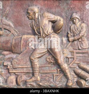 Corporal Seyit, carrying an artillery shell. In the long, bronze frieze ...