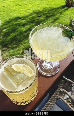 Fresh healthy cocktails on a wooden background Stock Photo - Alamy