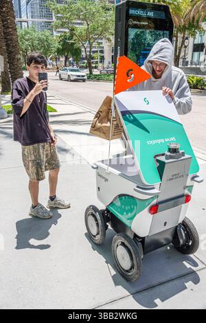 Serve Robotics Delivery Robot on the Street, Delivering Food to a ...
