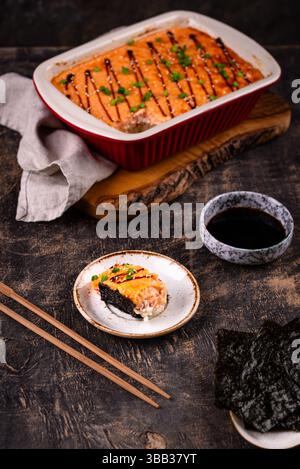 Baked sushi roll cake with crab surimi sticks Stock Photo - Alamy