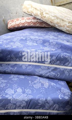 Detail of old and dirty mattress thrown into the trash, recycling Stock ...