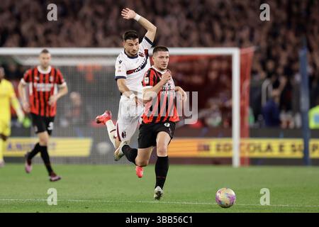 Bologna's Italian forward Riccardo Orsolini challenges for the ball ...