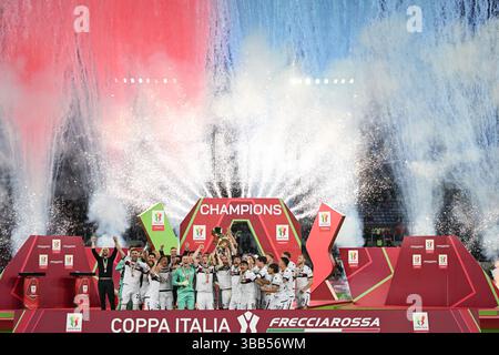 Bologna FC players lift the Italian Cup trophy as they celebrate on the ...