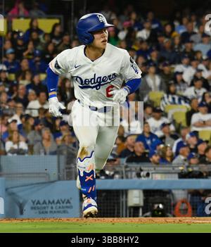 Los Angeles Dodgers' Hyeseong Kim warms up prior to a baseball game ...