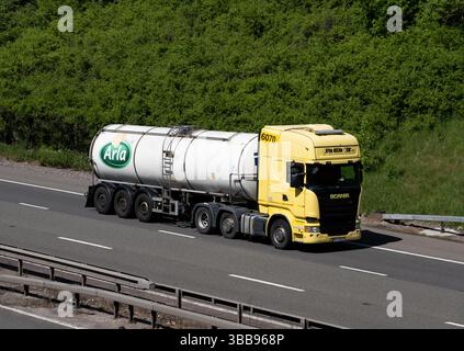 Arla tanker lorry on the M40 motorway, Warwickshire, UK Stock Photo - Alamy