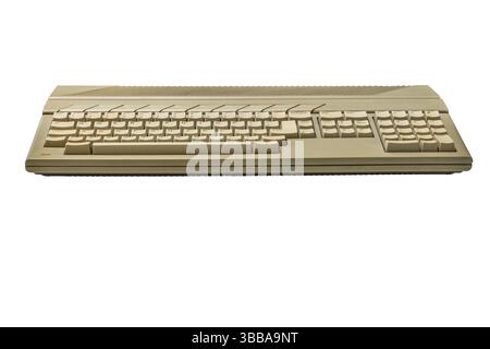 Antique computer from the 1990s on a white background, a museum piece ...