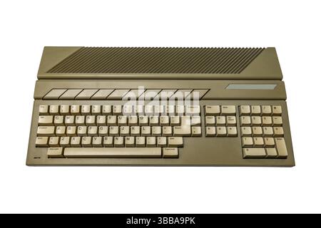 Antique computer from the 1990s on a white background, a museum piece ...
