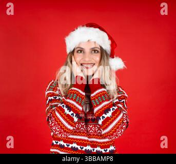 Portrait of minded attractive girl hand touch chin hold paper like card ...