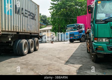 Yangon, Myanmar - 6 April, 2025: Heavy trucks standing as part of the ...