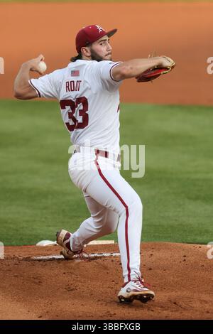 May 1, 2025: Hogs pitcher Zach Root (33) looks into the target as he ...