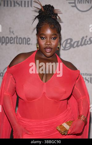 Achieng Agutu attends the Sports Illustrated Swimsuit Edition launch ...
