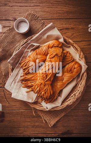 Smoked braided cheese isolated on white background Stock Photo - Alamy