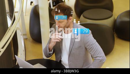 Images of falling social media icons over caucasian women using laptop ...