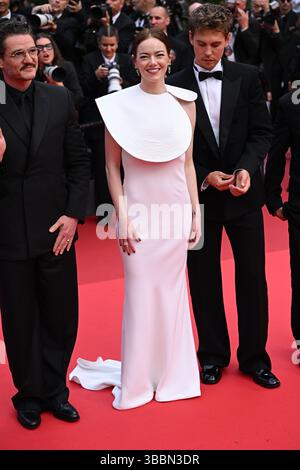 Emma Stone, left, and Pedro Pascal pose for photographers upon arrival ...