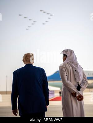 President Donald Trump walks towards reporters from the South Lawn of ...