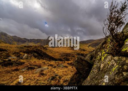 Rugged Highland mountains rising above coastal landscape on Isle of ...