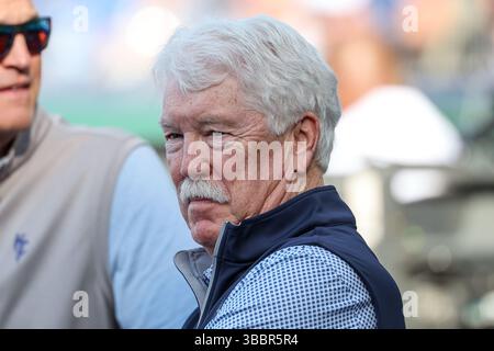 Kansas City Royals owner John Sherman watches a workout during spring ...