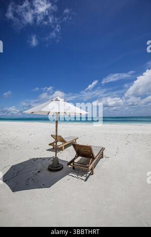 Beach with umbrellas and a bright water Stock Photo - Alamy