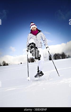 Fit is the way to go. a young woman working out with kettlebells Stock ...
