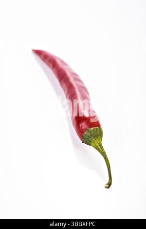 A still life shoot of red pepper on the fork Stock Photo - Alamy