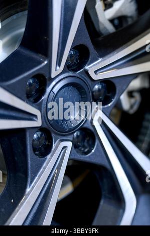 Car wheel with brake calipers and stylish design. Cast disk close up ...