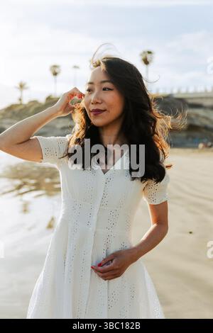 asian woman touching hand face mirror in hands skin care Stock Photo ...
