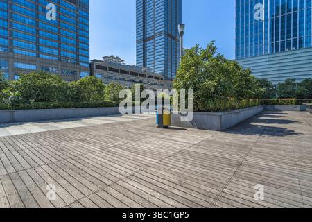 Empty wooden footpath front modern building Stock Photo - Alamy
