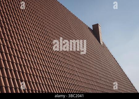 Roof with traditional polish tile and chimney Stock Photo - Alamy
