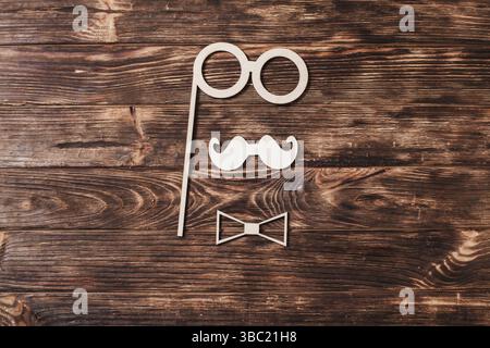 Glasses with paper mustache bow tie Stock Photo - Alamy