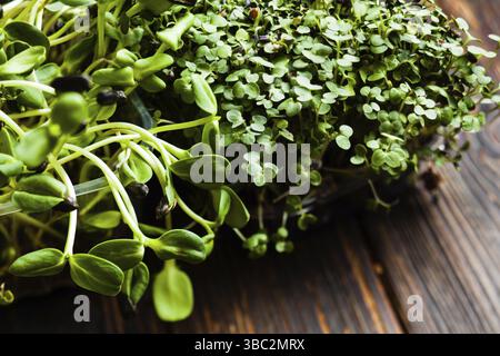 Assortment of micro greens on wooden table. Healthy food Stock Photo ...