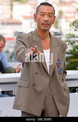 Juno Mak poses at the photocall of 'Sons Of The Neon Night' during the ...