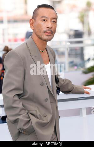 Juno Mak poses at the photocall of 'Sons Of The Neon Night' during the ...