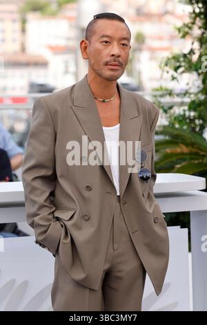 Juno Mak poses at the photocall of 'Sons Of The Neon Night' during the ...