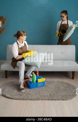 Professional Sofa Cleaning Service Using Vacuum Cleaner Stock Photo - Alamy