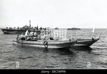 A Japanese boat making contact with a squadron of US torpedo boats ...