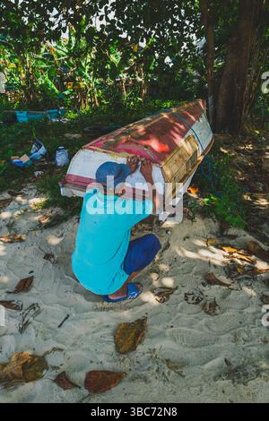 Balikpapan, Indonesia - April 20th 2025. The fisherman is standing in ...
