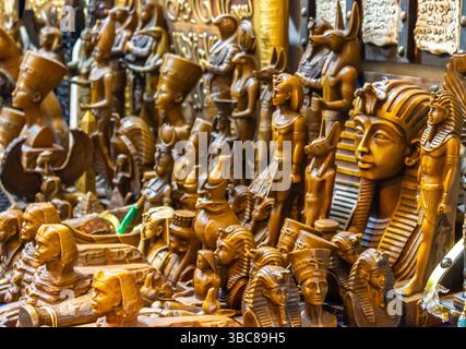Traditional stone statues and decorative figurines inside the courtyard ...