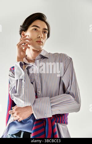 A young non binary individual showcases their vibrant style in a ...