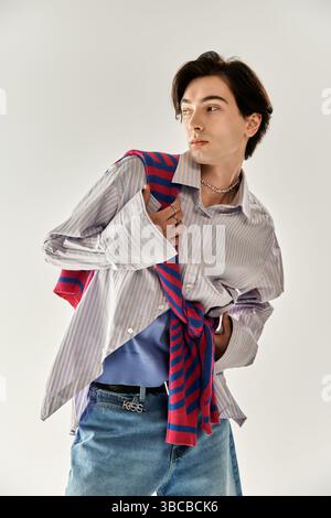 A young non binary individual showcases their vibrant style in a ...