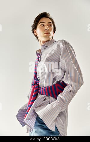 Fashionable non binary individual poses confidently, celebrating unique ...