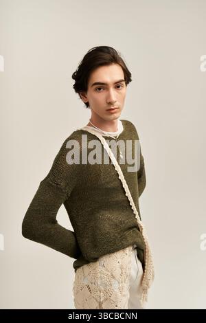 A stylish non binary individual showcases fashion and pride in a ...