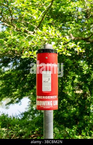Red emergency life saving throwing line container Stock Photo - Alamy