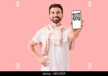 Barcode QR on a pink background close up Stock Photo - Alamy