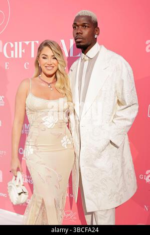 Paul Pogba mit Ehefrau Maria Zulay Pogba Salaues bei der Global Gift ...